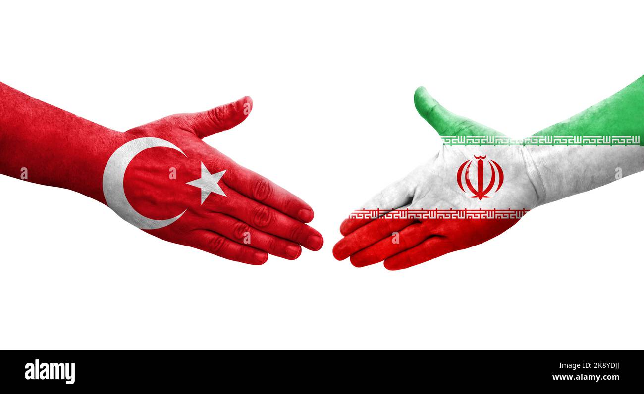 Handshake between Iran and Turkey flags painted on hands, isolated ...