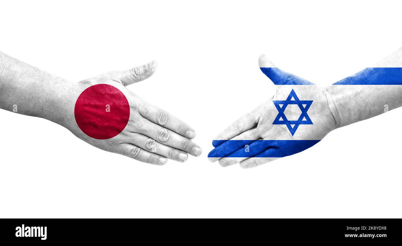 Handshake between Israel and Japan flags painted on hands, isolated ...