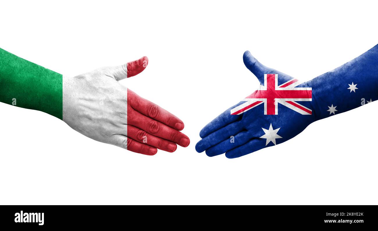 Handshake between Italy and Australia flags painted on hands, isolated ...