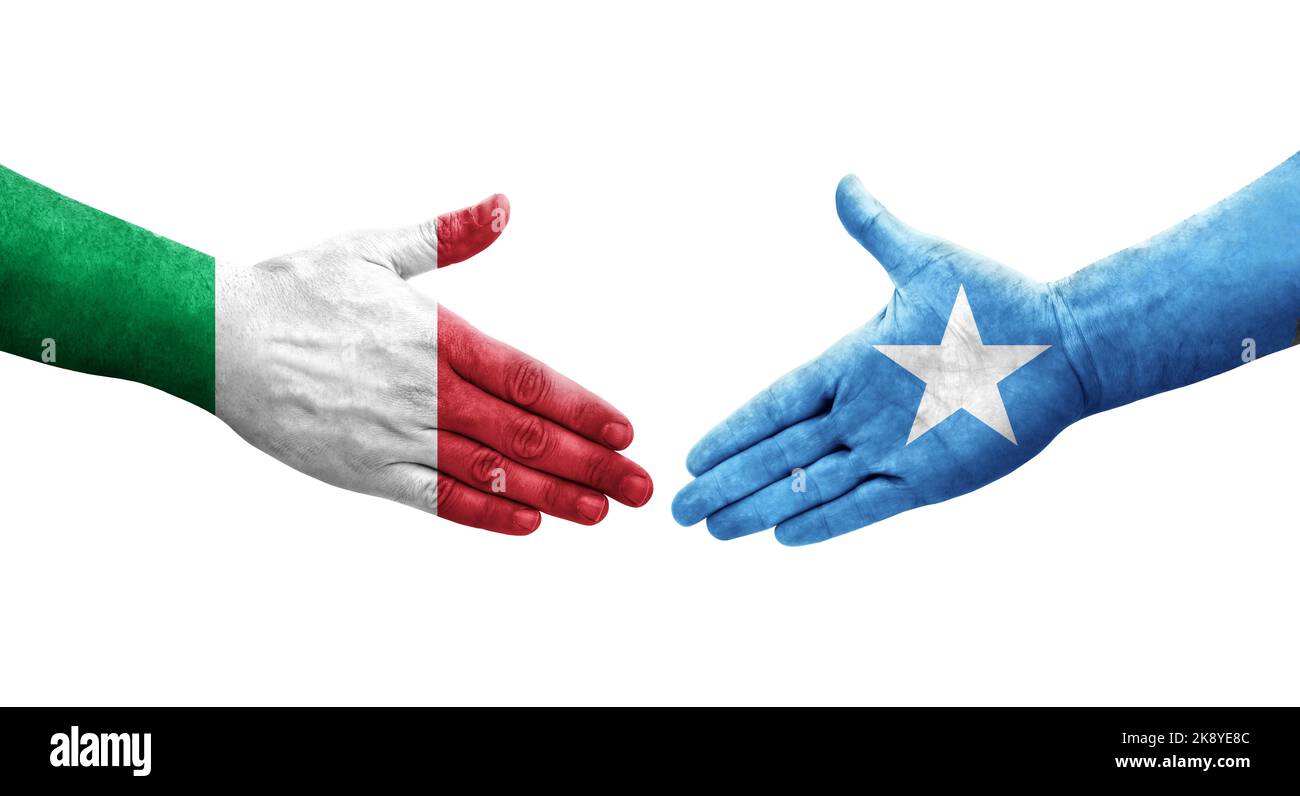 Handshake between Italy and Somalia flags painted on hands, isolated ...