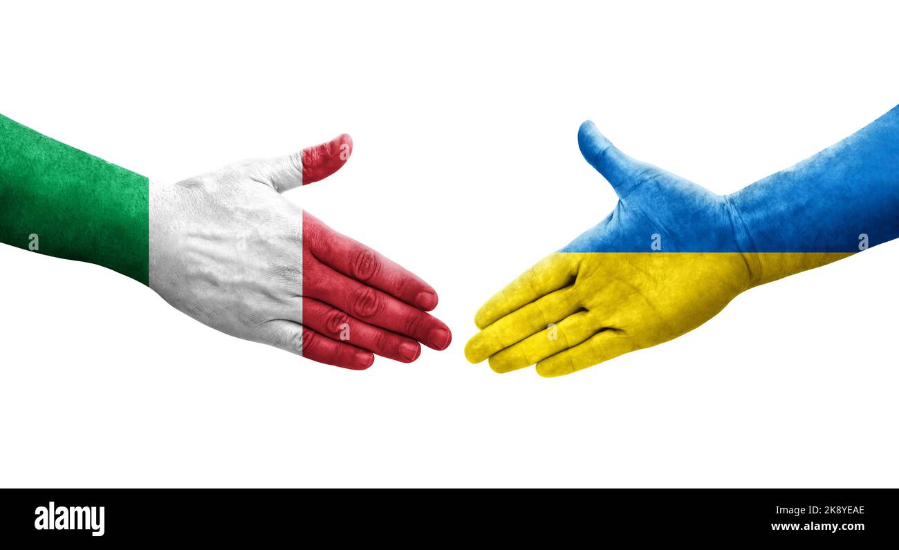 Handshake between Italy and Ukraine flags painted on hands, isolated ...
