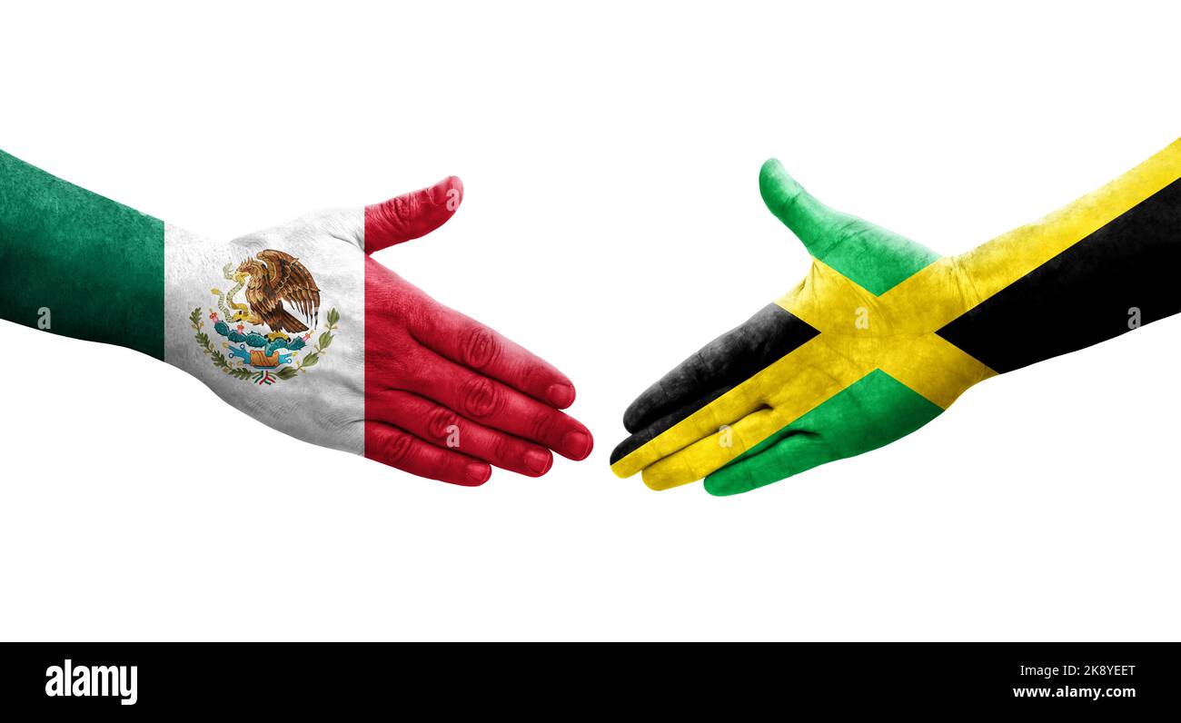 Handshake between Jamaica and Mexico flags painted on hands, isolated ...