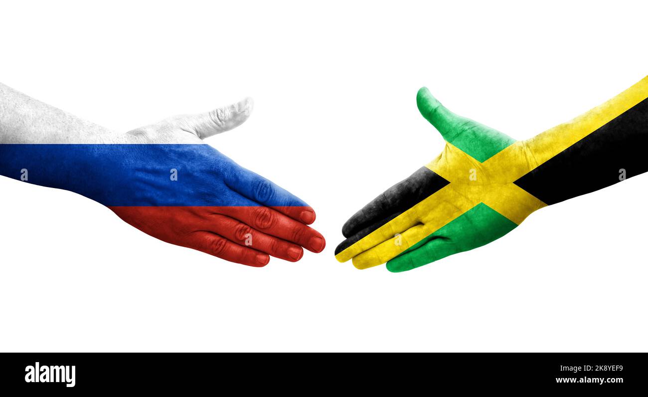 Handshake between Jamaica and Russia flags painted on hands, isolated ...