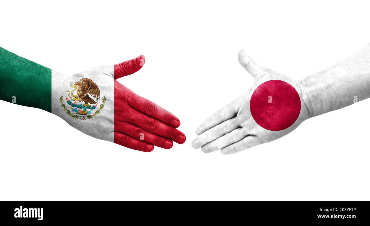 Handshake between Japan and Mexico flags painted on hands, isolated ...