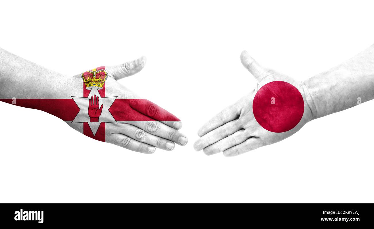 Handshake between Japan and Northern Ireland flags painted on hands ...