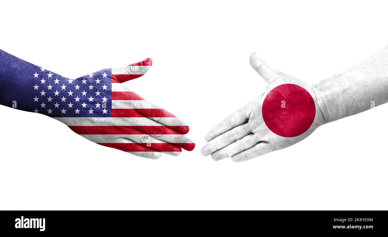Handshake between Japan and USA flags painted on hands, isolated ...