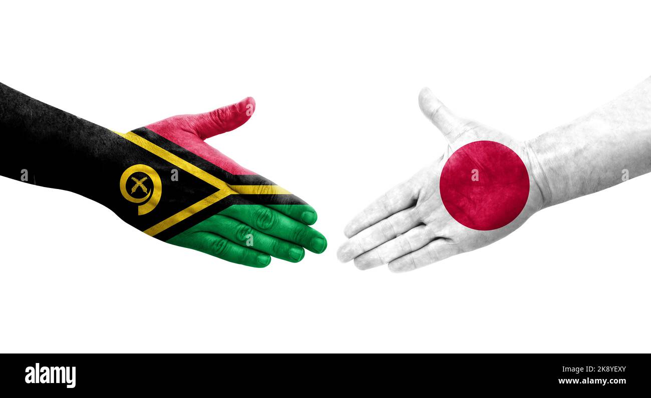 Handshake between Japan and Vanuatu flags painted on hands, isolated ...