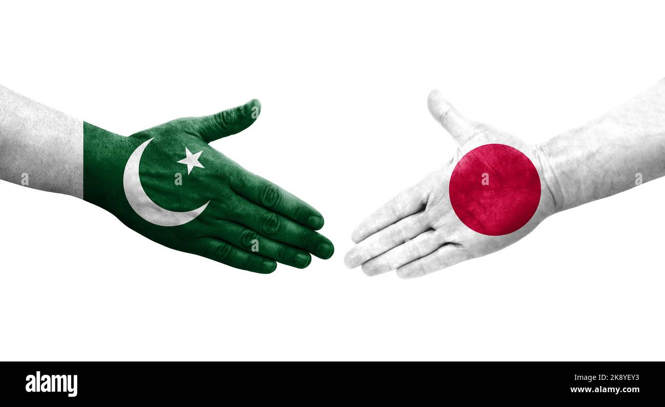 Handshake between Japan and Pakistan flags painted on hands, isolated ...
