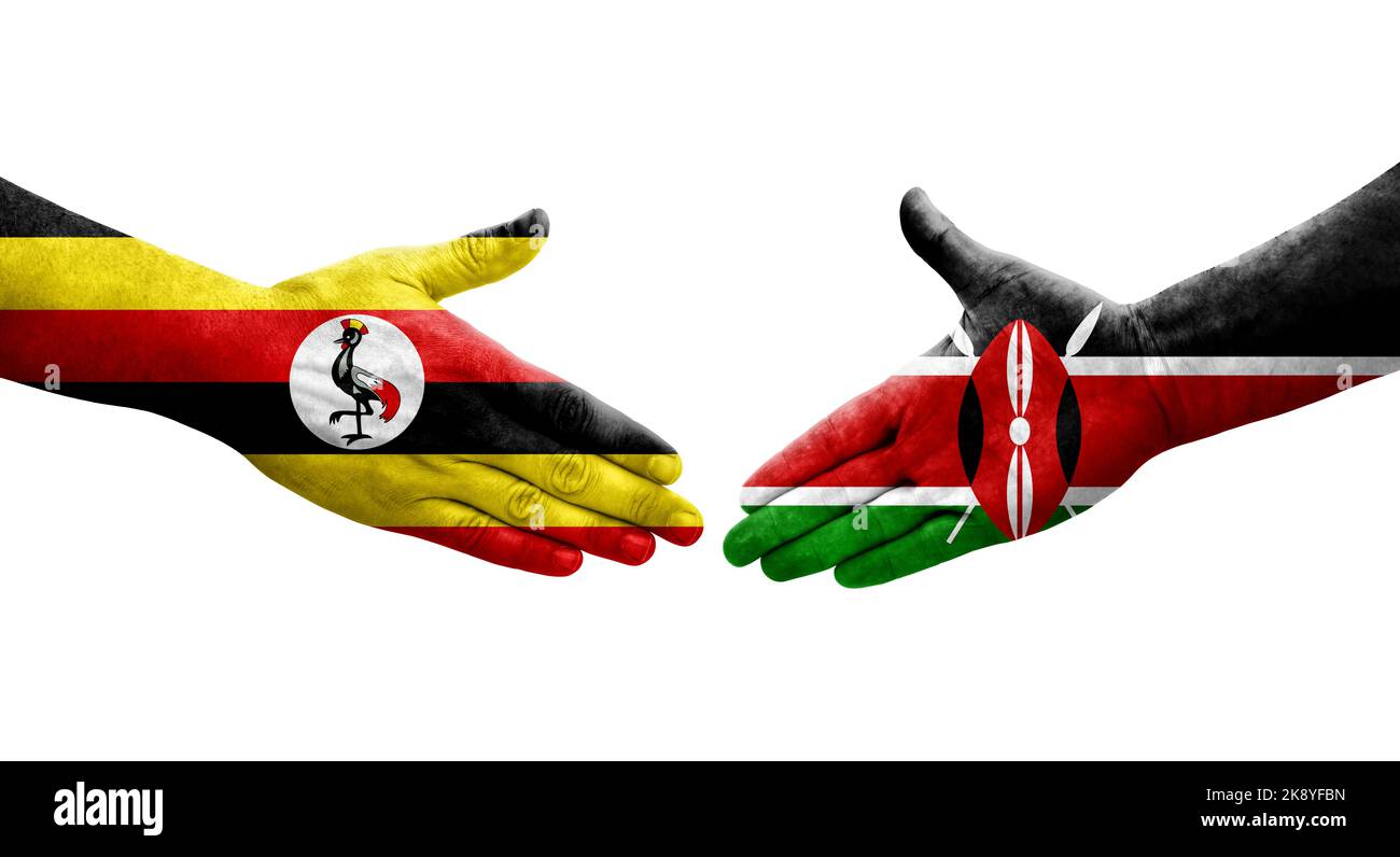 Handshake between Kenya and Uganda flags painted on hands, isolated ...