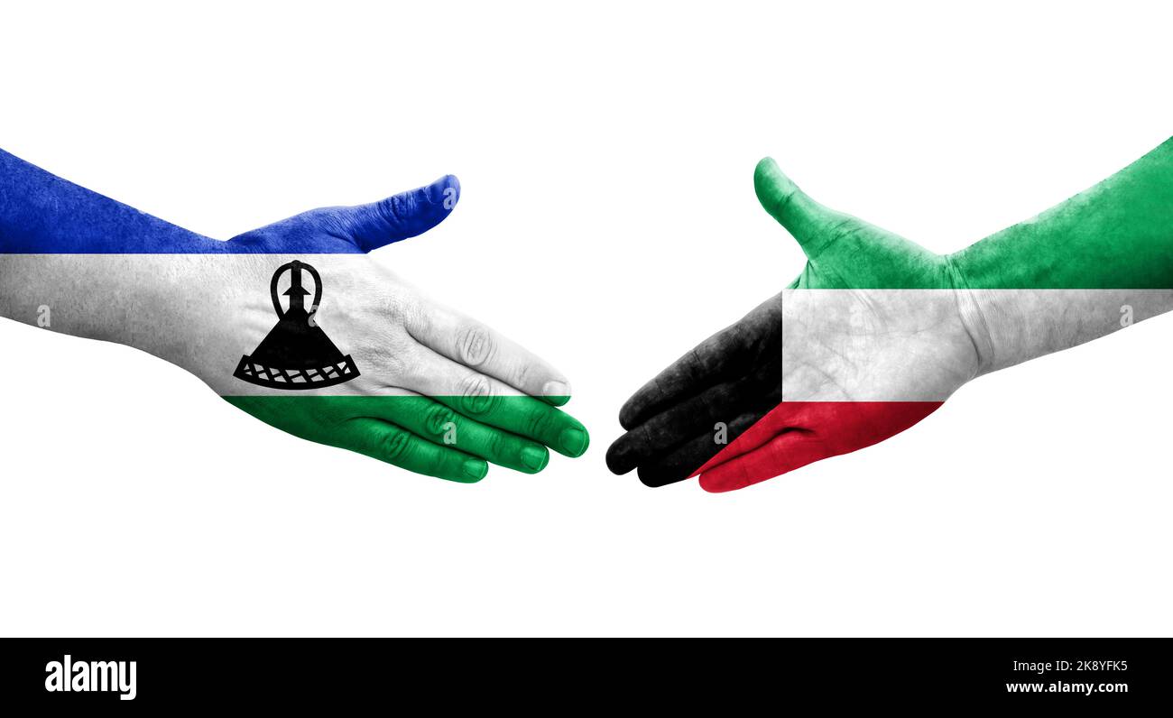 Handshake between Kuwait and Lesotho flags painted on hands, isolated ...