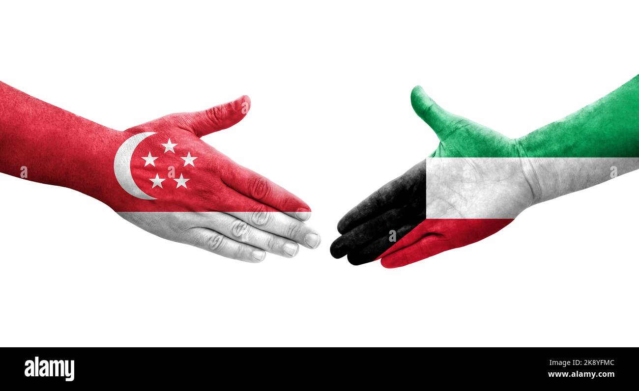 Handshake between Kuwait and Singapore flags painted on hands, isolated ...