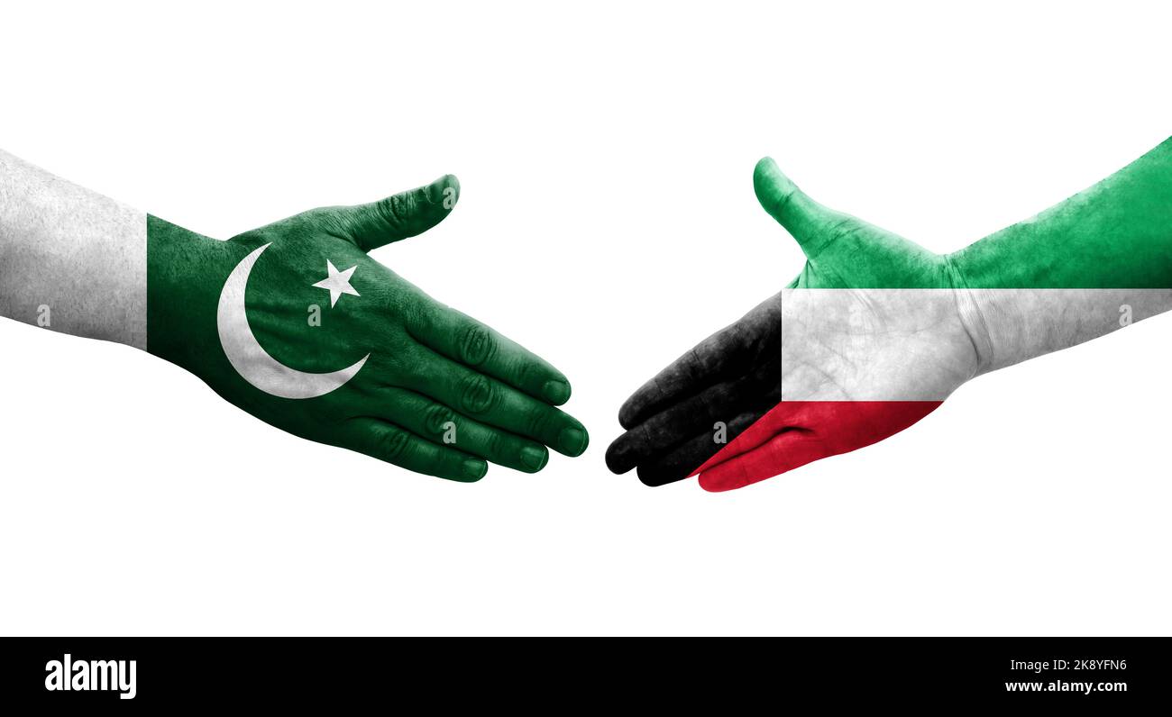 Handshake between Kuwait and Pakistan flags painted on hands, isolated ...