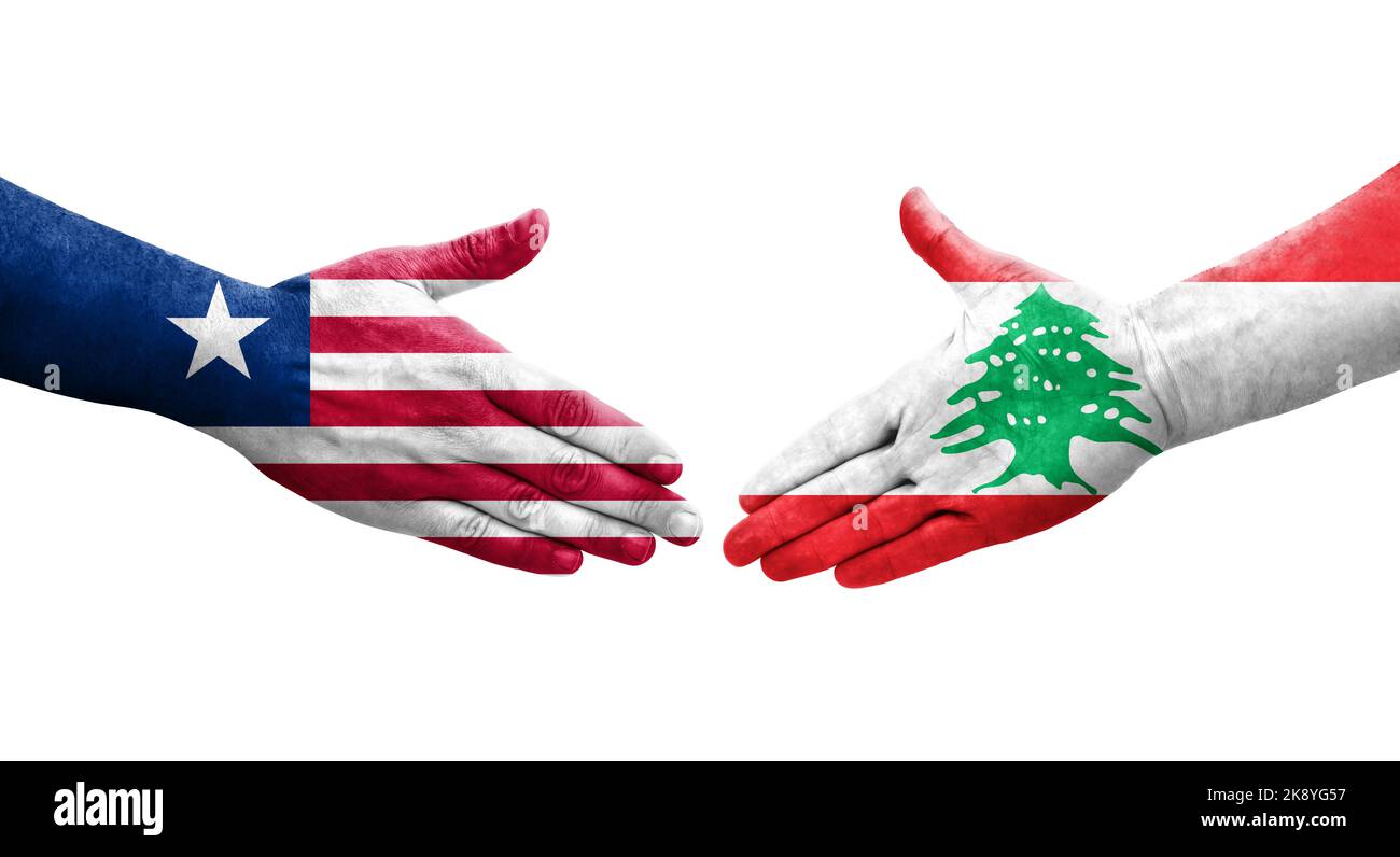 Handshake between Lebanon and Liberia flags painted on hands, isolated ...