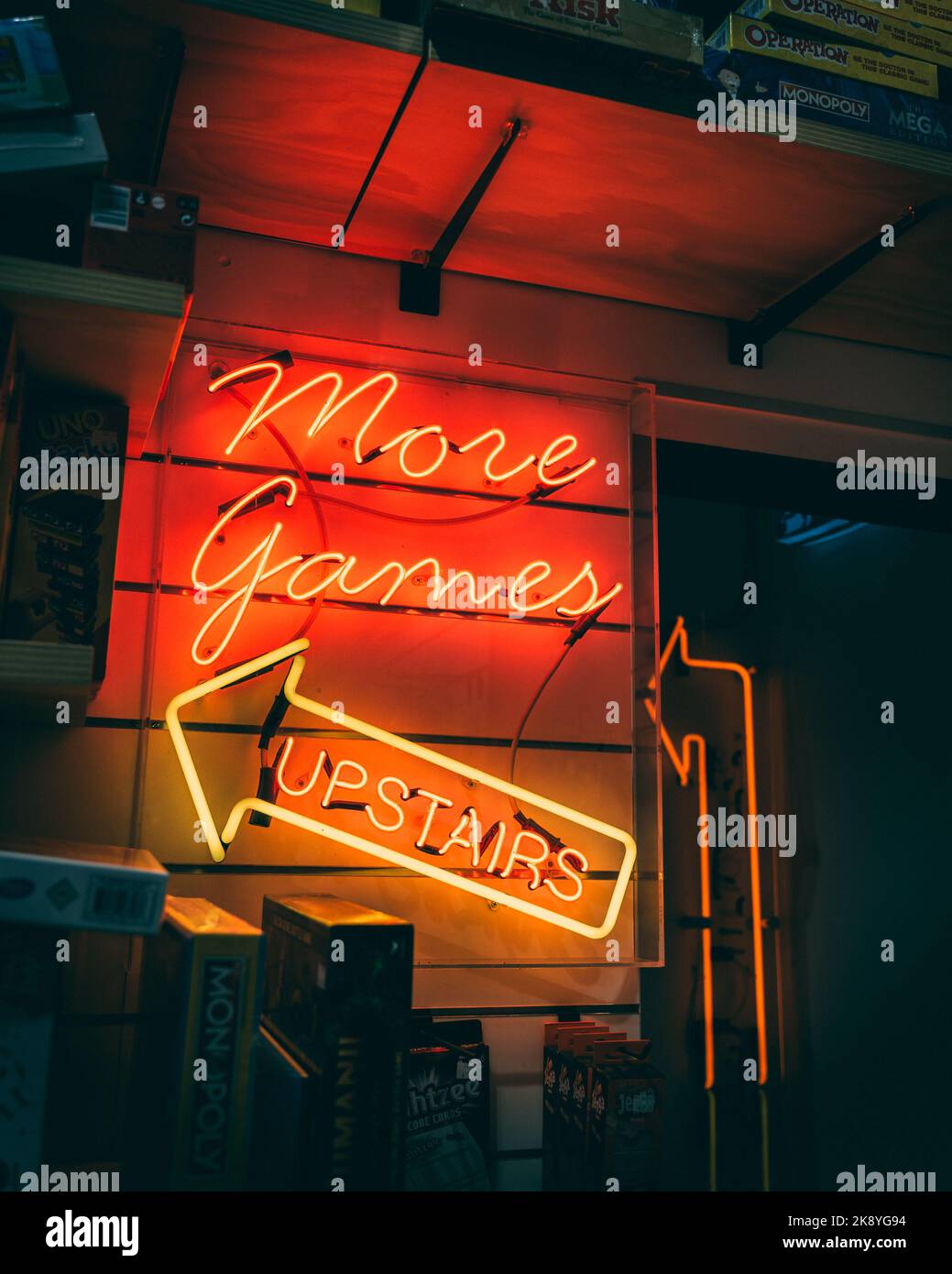 A vertical shot of board games' store with neon sign in Melbourne ...
