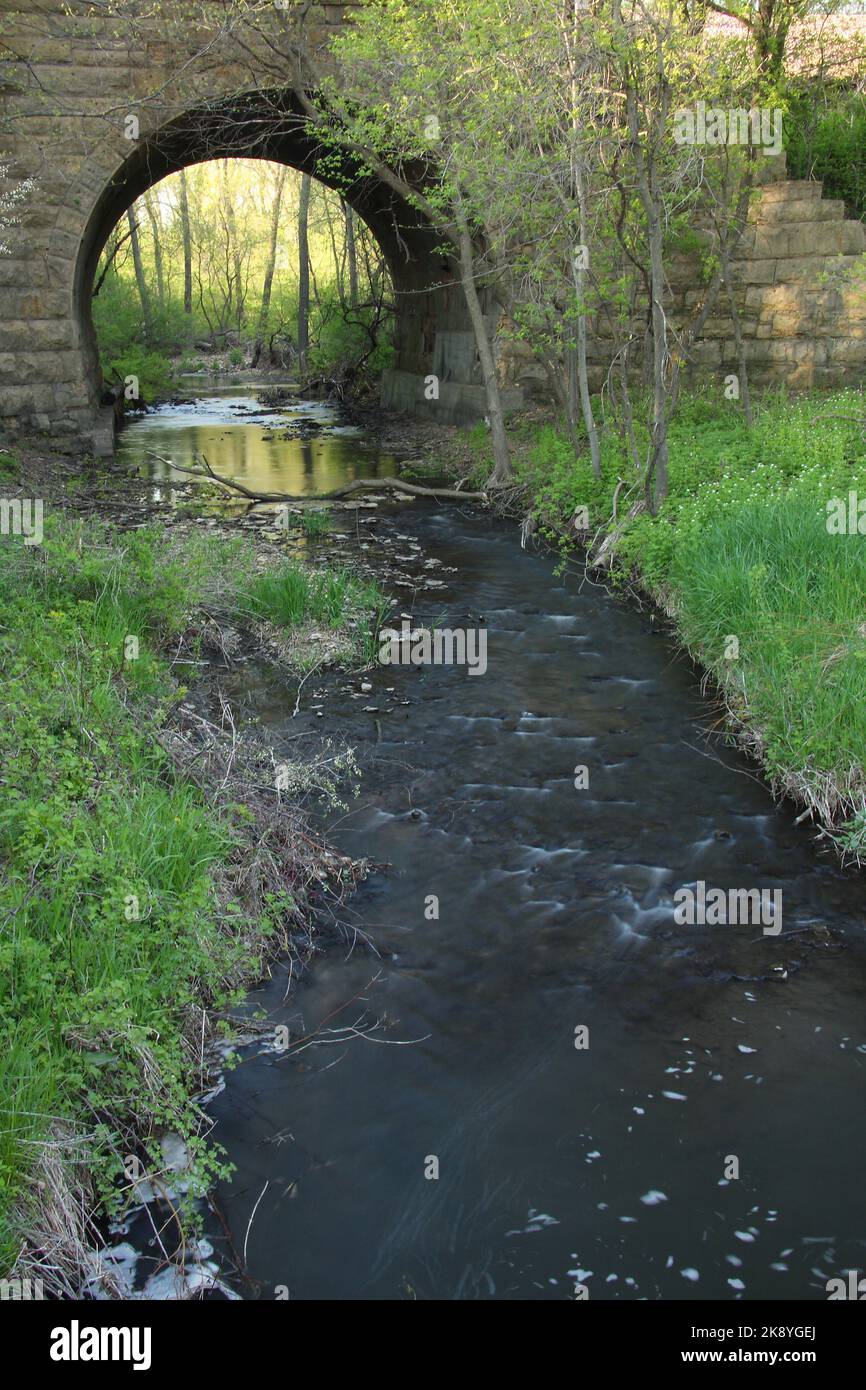 A Stone Arch Bridge In Spring Stock Photo - Alamy