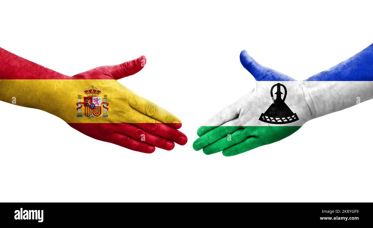 Handshake between Lesotho and Spain flags painted on hands, isolated ...