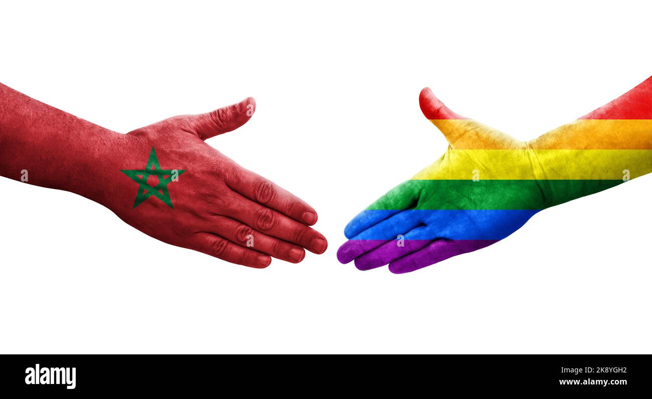Handshake between LGBT and Morocco flags painted on hands, isolated ...
