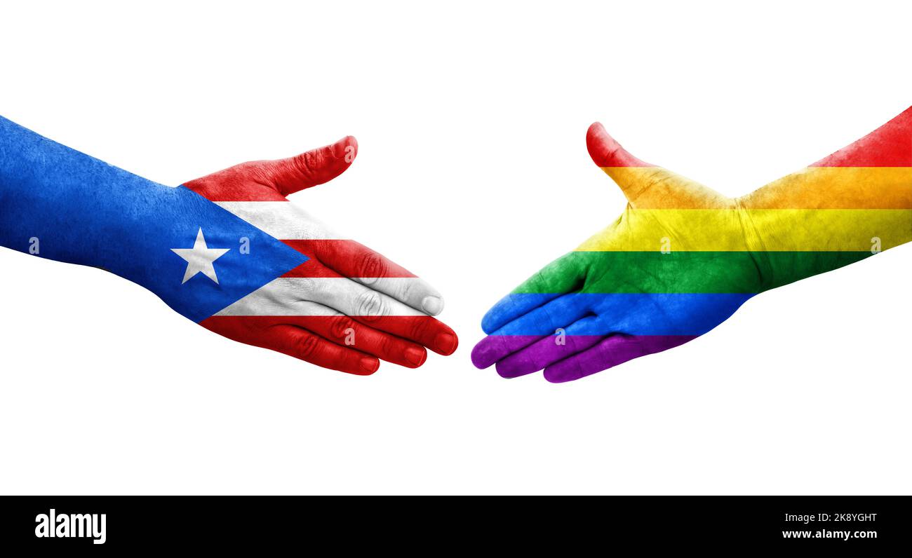 Handshake between LGBT and Puerto Rico flags painted on hands, isolated ...