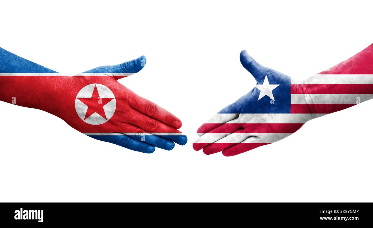 Handshake between Liberia and North Korea flags painted on hands ...
