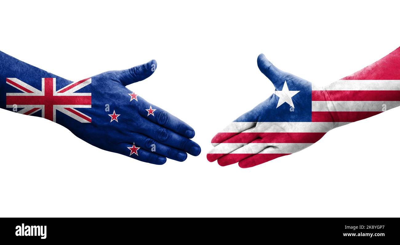 Handshake between Liberia and New Zealand flags painted on hands ...