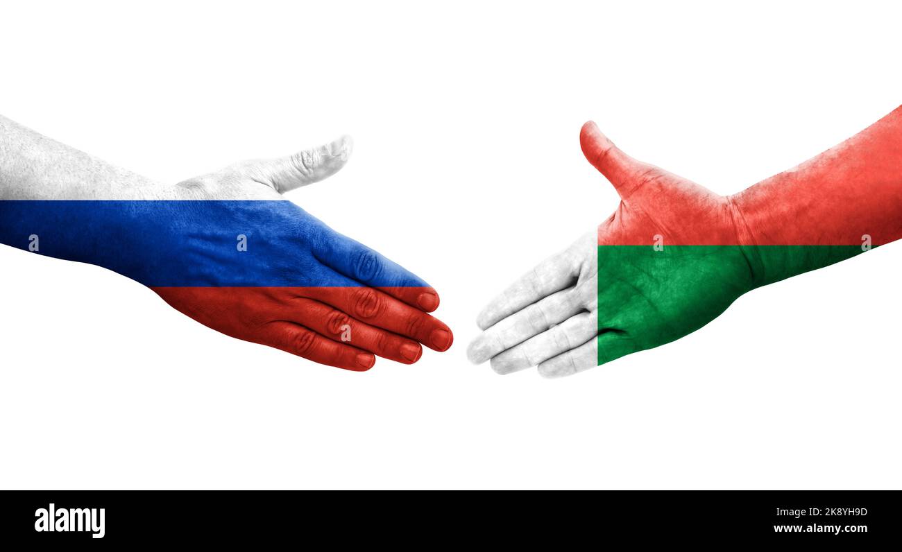 Handshake between Madagascar and Russia flags painted on hands ...