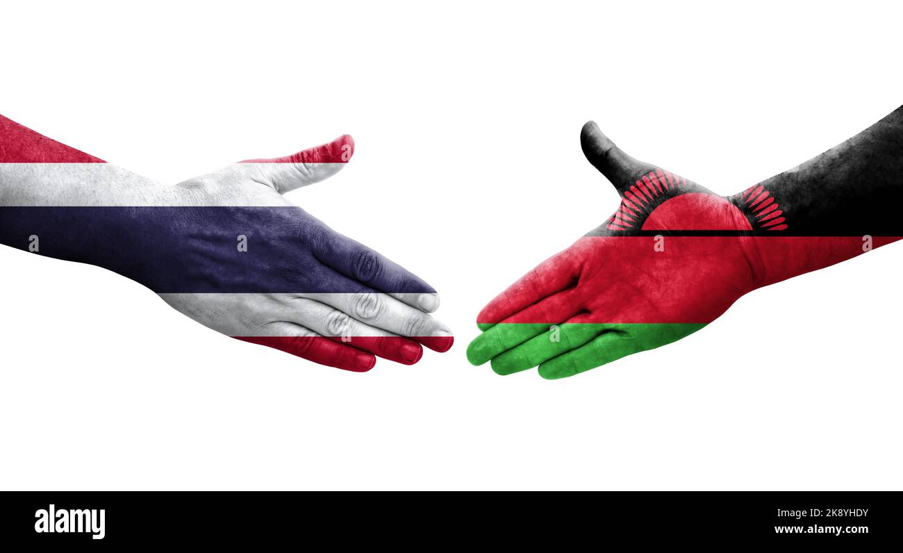 Handshake between Malawi and Thailand flags painted on hands, isolated ...