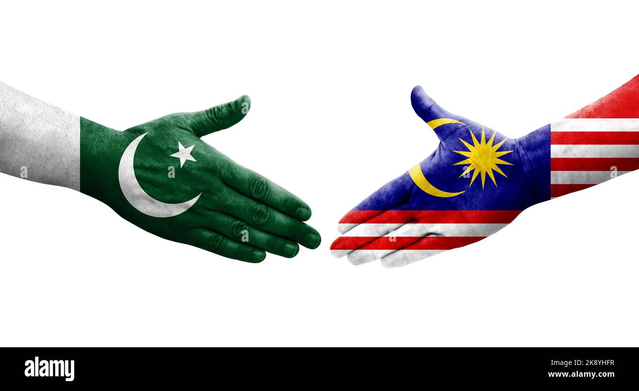 Handshake between Malaysia and Pakistan flags painted on hands ...