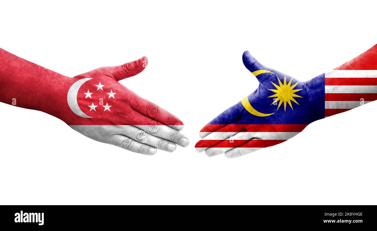 Handshake between Malaysia and Singapore flags painted on hands ...