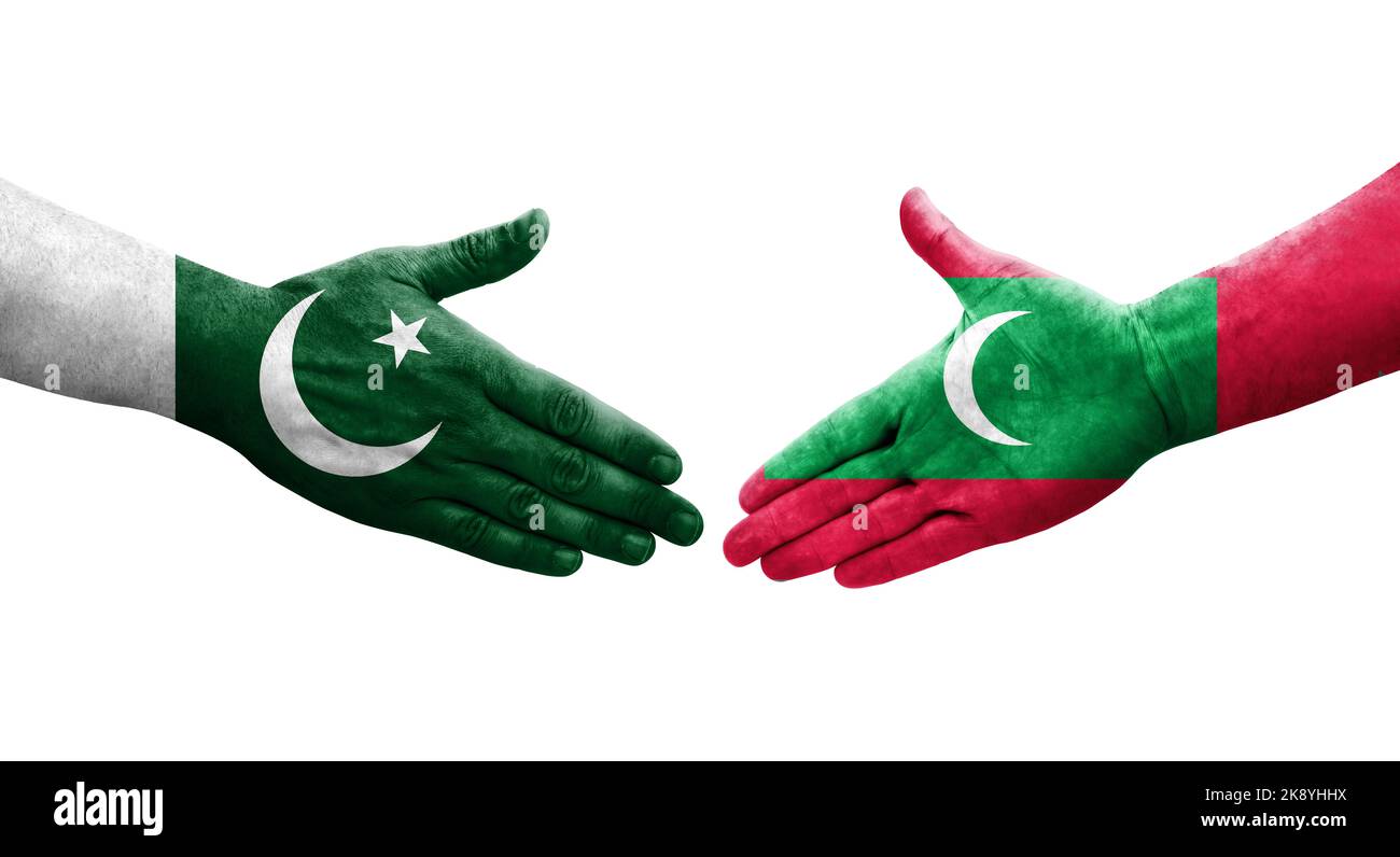 Handshake between Maldives and Pakistan flags painted on hands ...