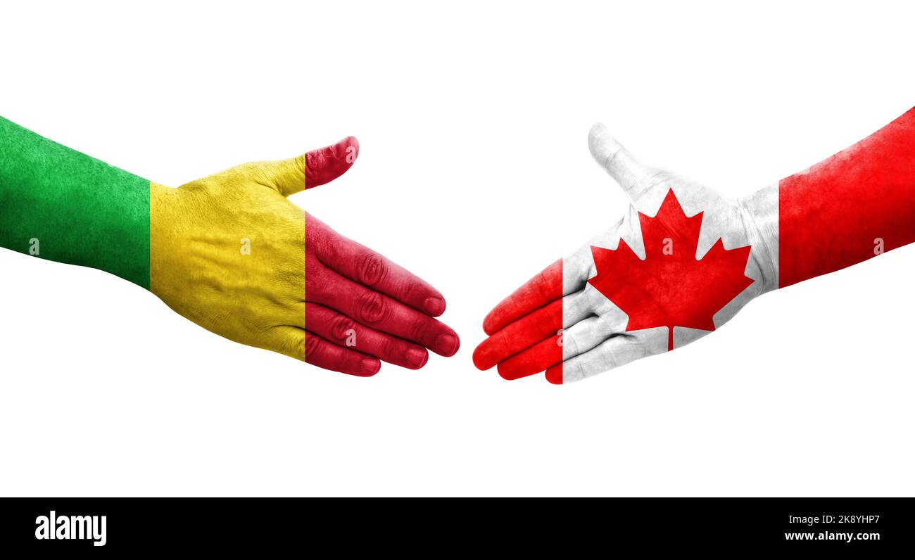 Handshake between Mali and Canada flags painted on hands, isolated ...