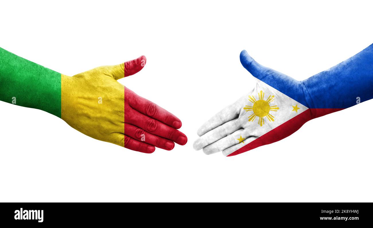Handshake between Mali and Philippines flags painted on hands, isolated ...