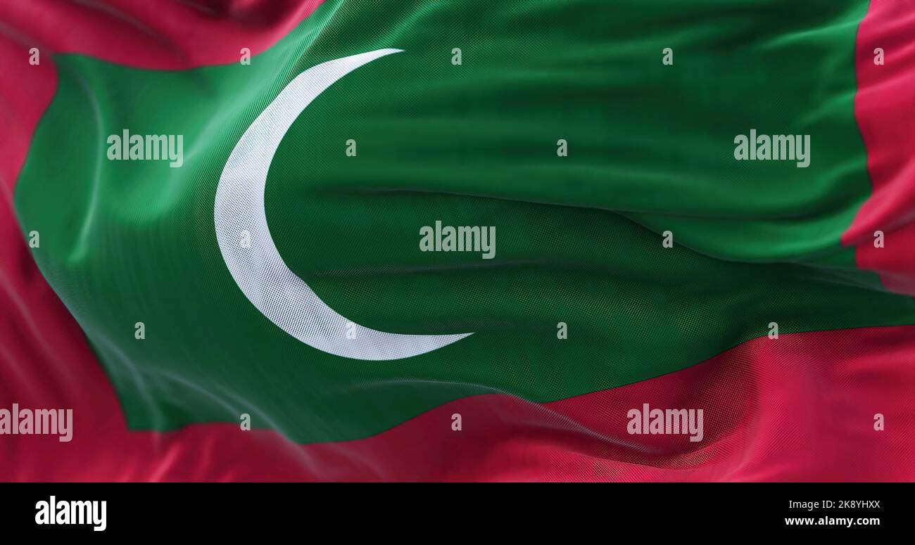 Close-up view of the Maldives national flag waving. The Republic of ...