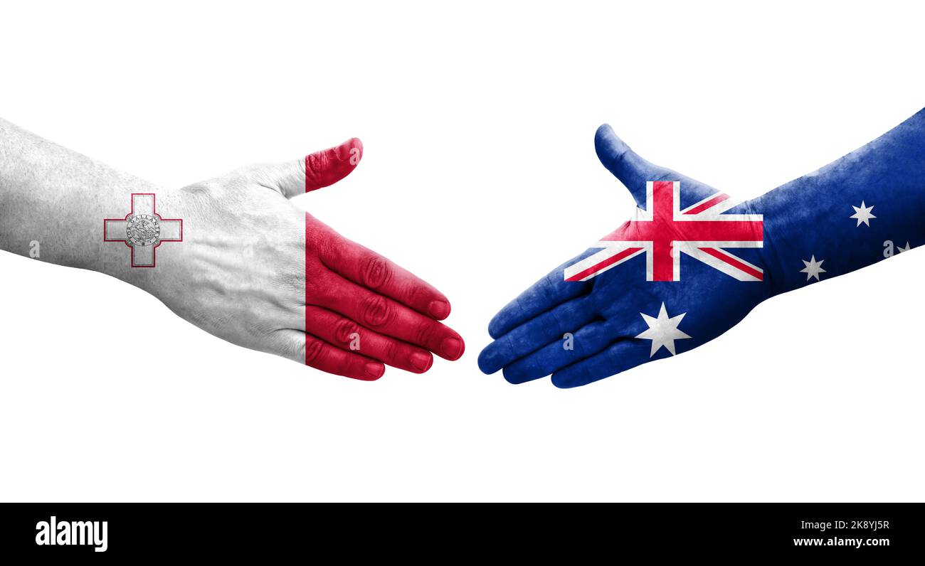 Handshake between Malta and Australia flags painted on hands, isolated ...