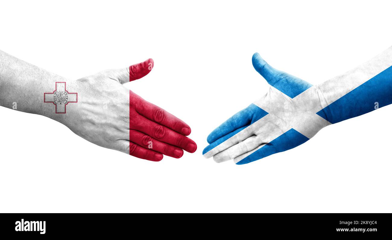 Handshake between Malta and Scotland flags painted on hands, isolated ...