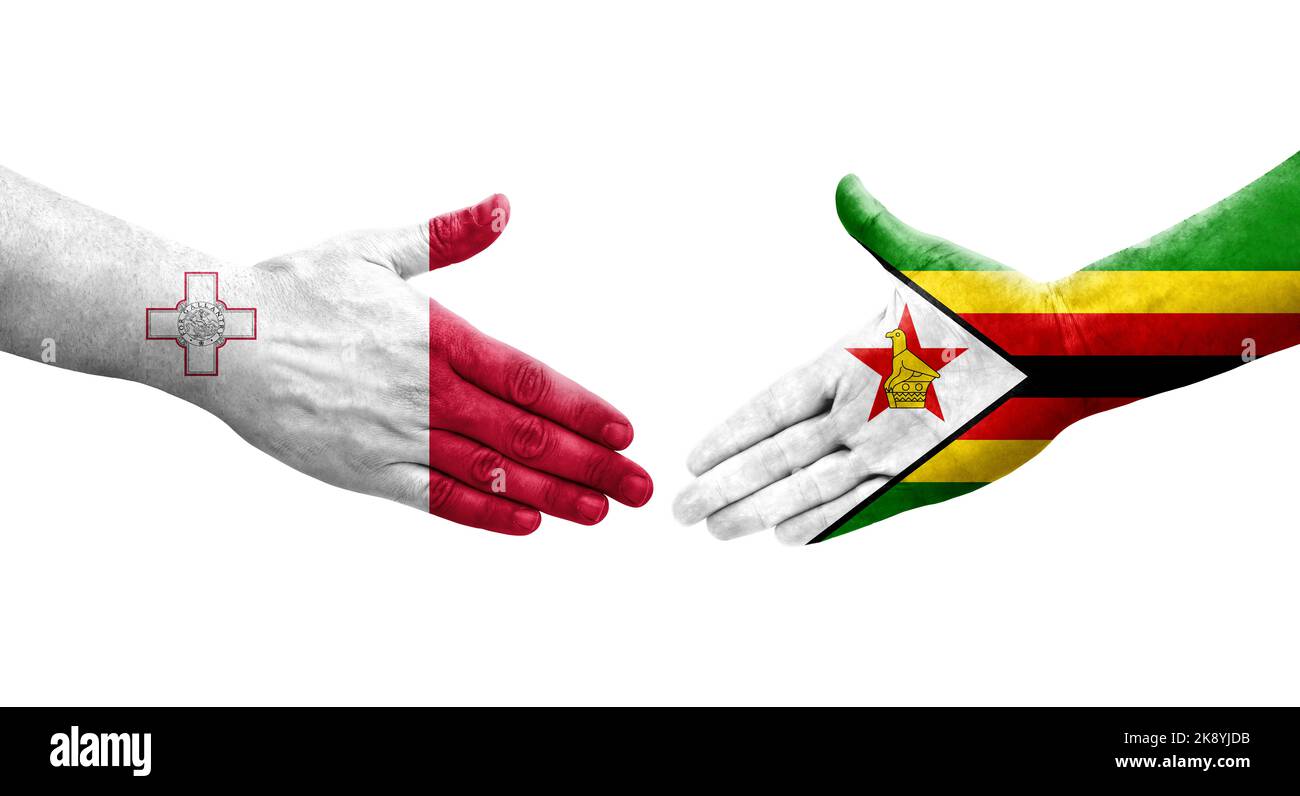 Handshake between Malta and Zimbabwe flags painted on hands, isolated ...