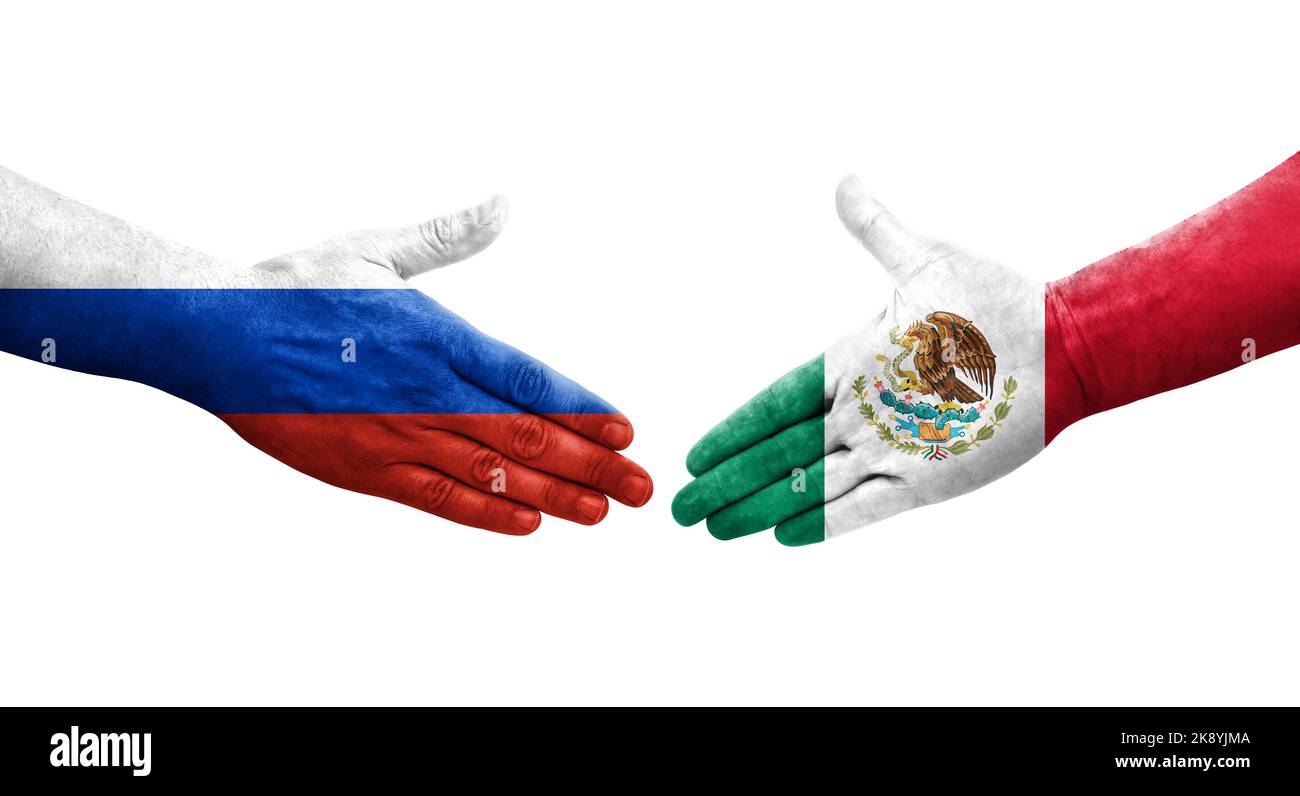 Handshake between Mexico and Russia flags painted on hands, isolated ...