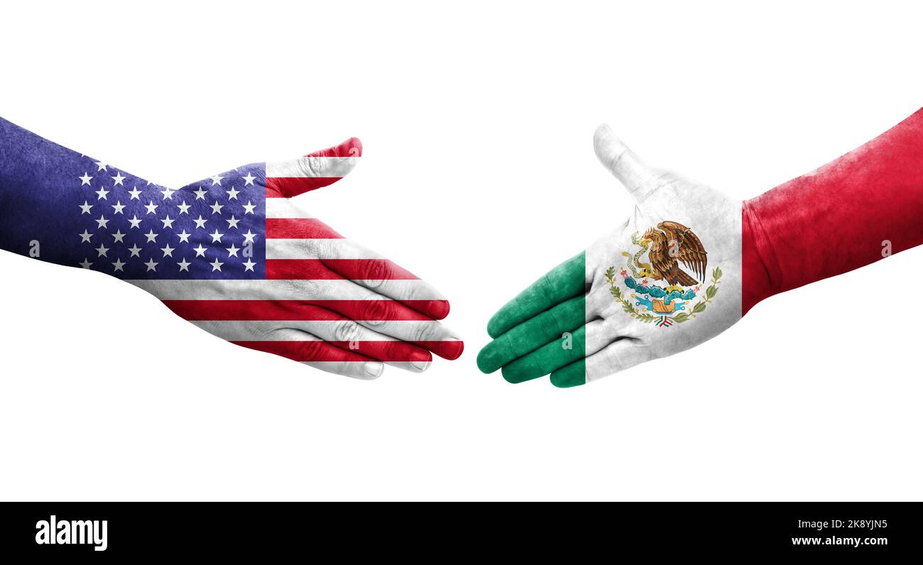 Handshake between Mexico and USA flags painted on hands, isolated ...