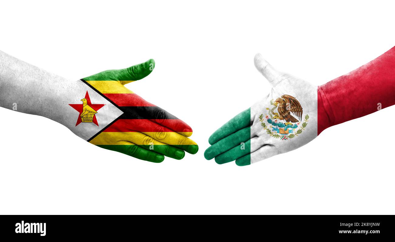 Handshake between Mexico and Zimbabwe flags painted on hands, isolated ...