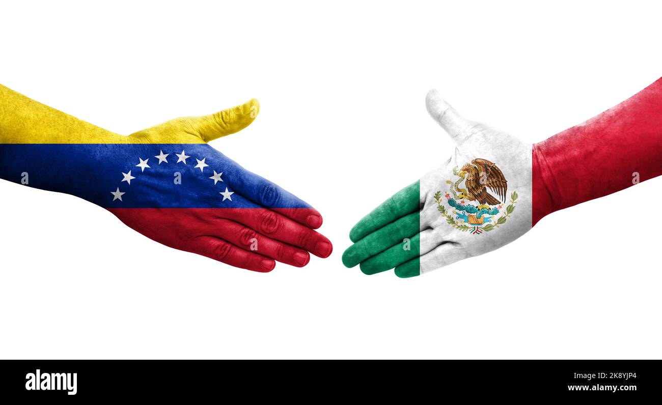 Handshake between Mexico and Venezuela flags painted on hands, isolated ...