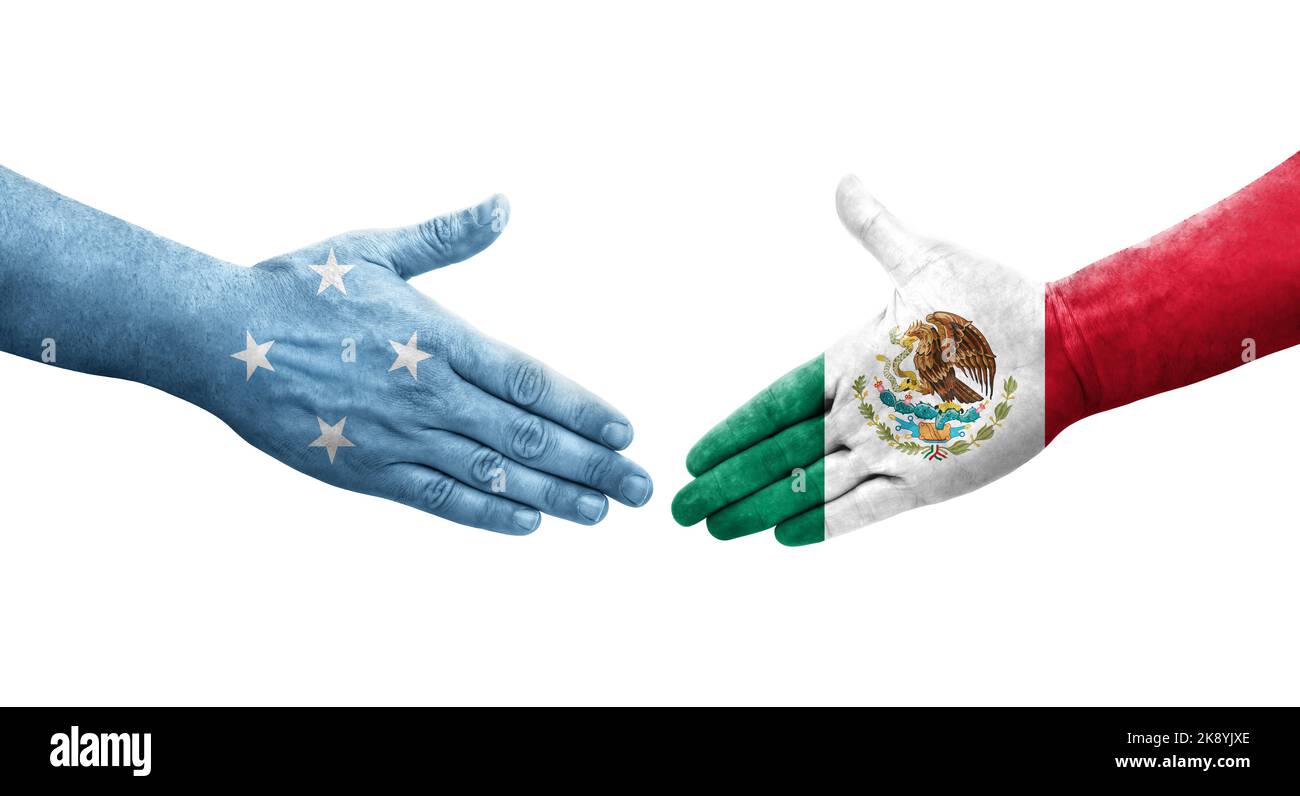 Handshake between Micronesia and Mexico flags painted on hands ...