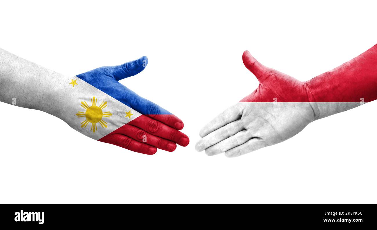 Handshake between Monaco and Philippines flags painted on hands ...