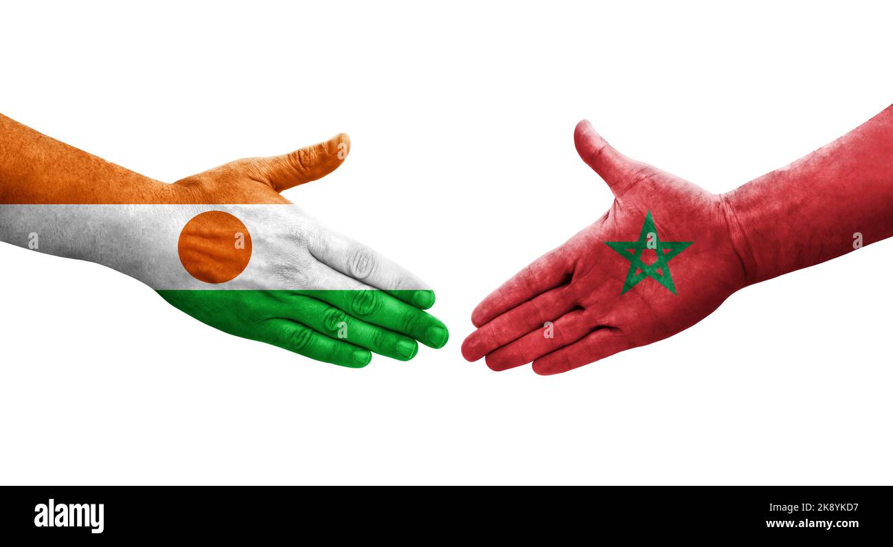 Handshake between Morocco and Niger flags painted on hands, isolated ...