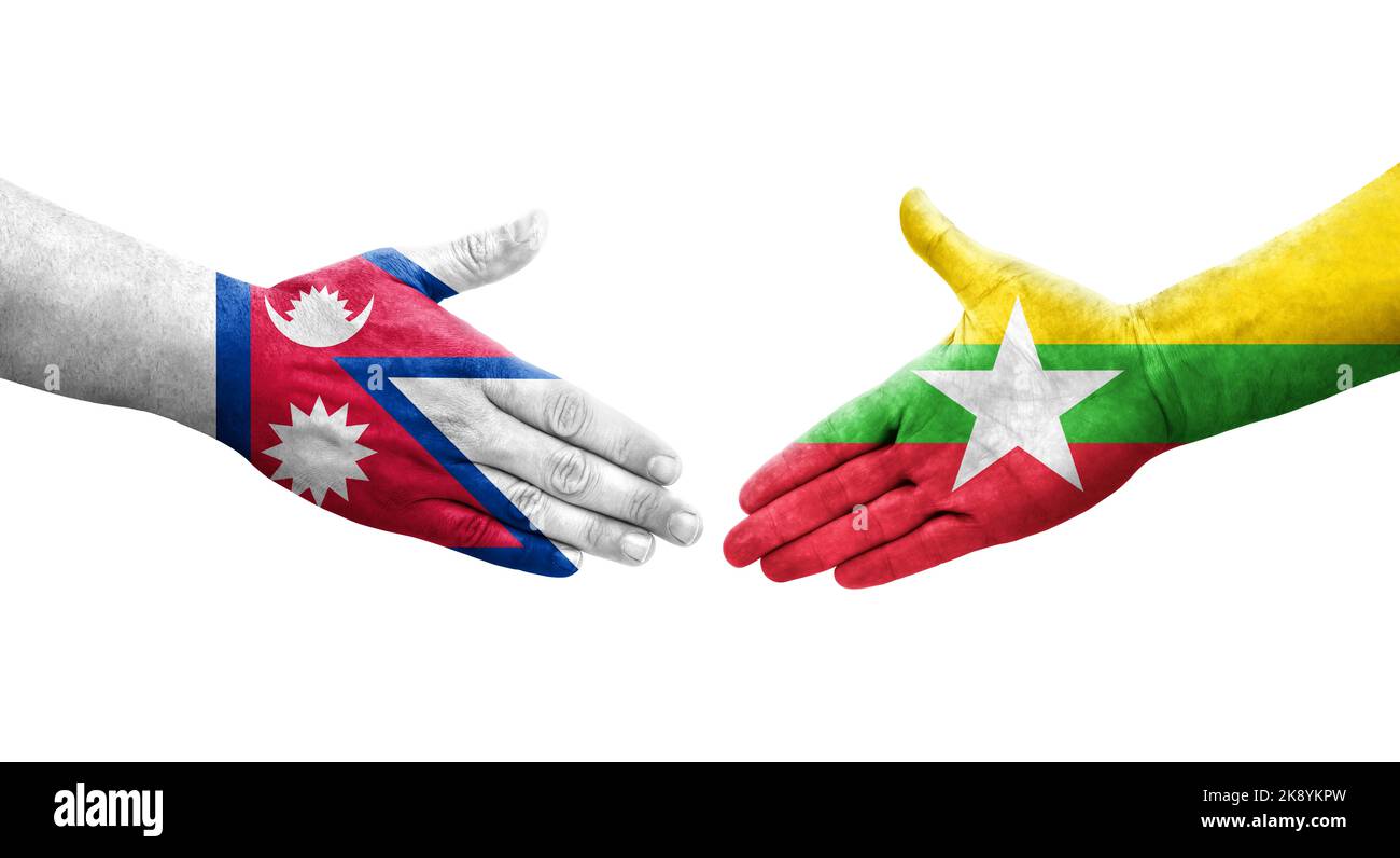 Handshake between Myanmar and Nepal flags painted on hands, isolated ...
