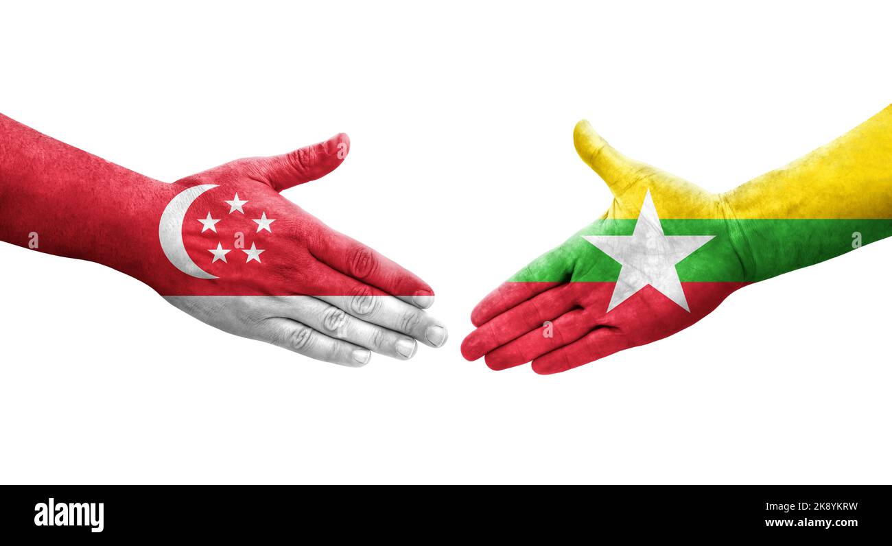 Handshake between Myanmar and Singapore flags painted on hands ...