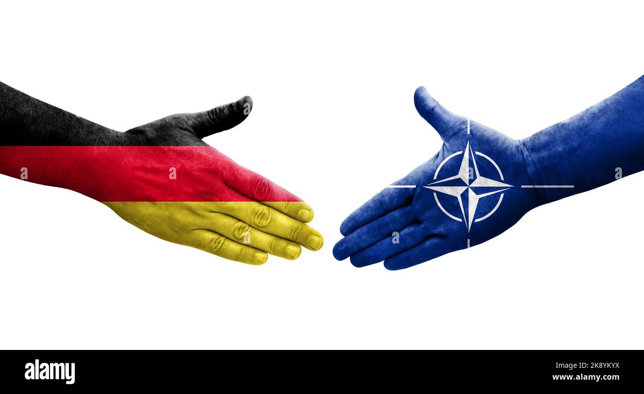Handshake between Nato and Germany flags painted on hands, isolated ...