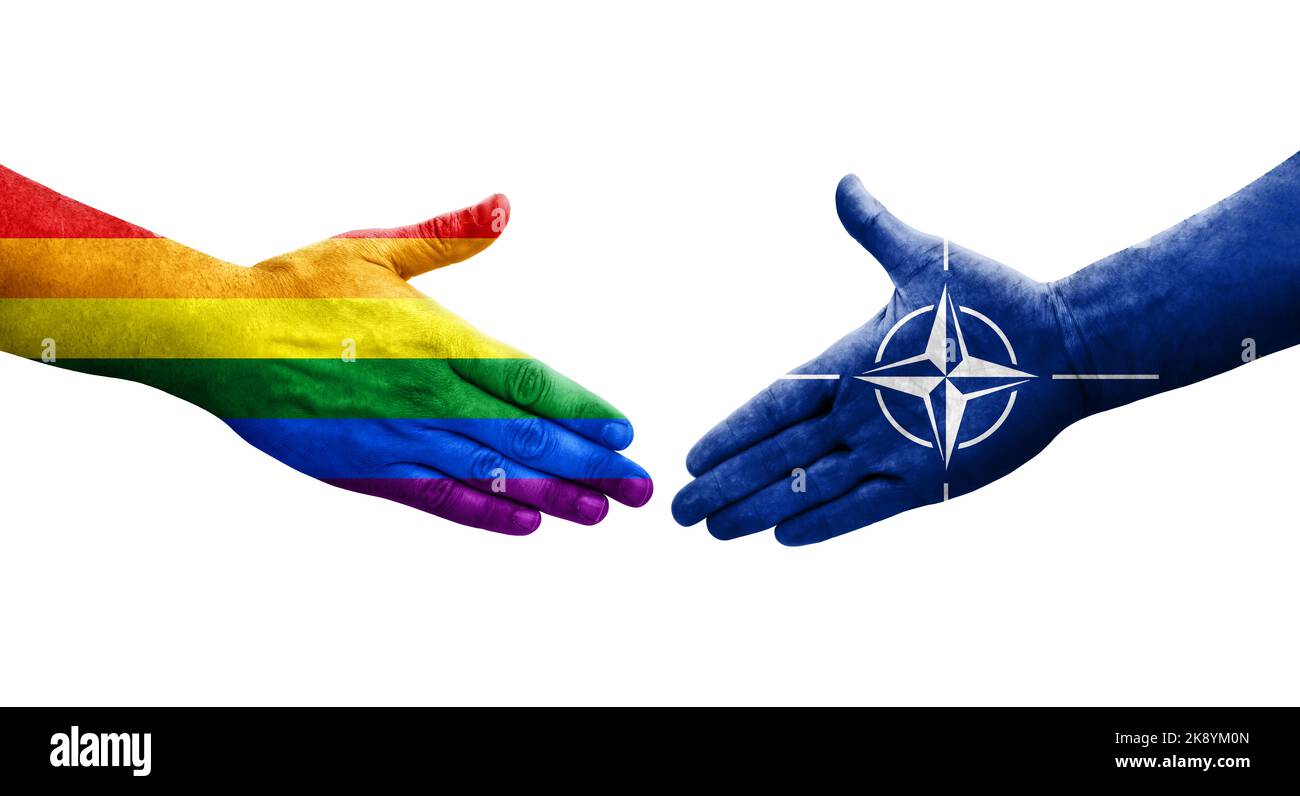 Handshake between Nato and LGBT flags painted on hands, isolated ...