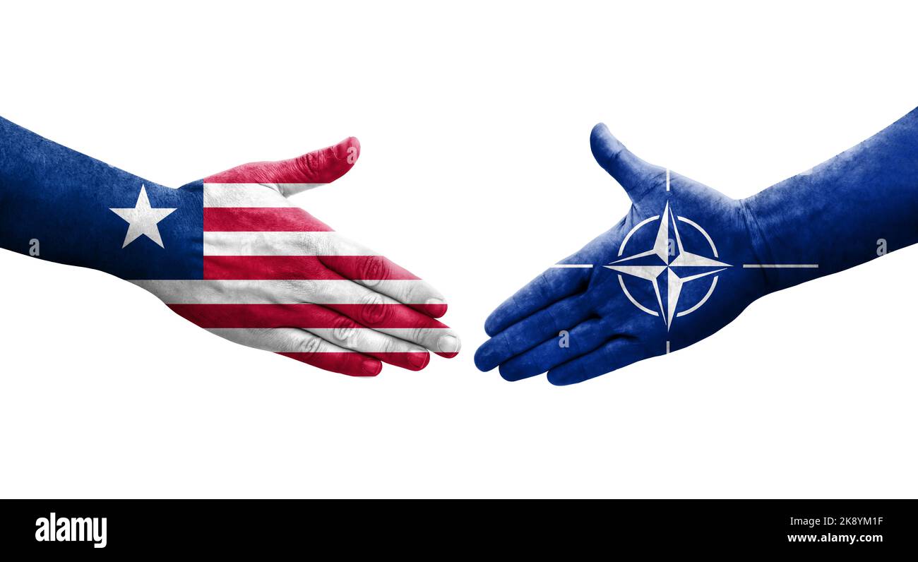 Handshake between Nato and Liberia flags painted on hands, isolated ...