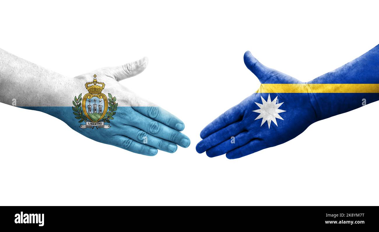 Handshake between Nauru and San Marino flags painted on hands, isolated ...