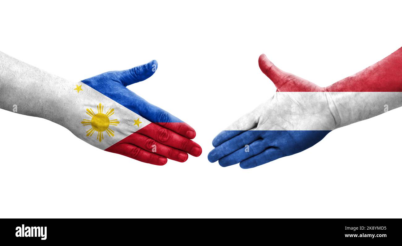 Handshake between Netherlands and Philippines flags painted on hands ...