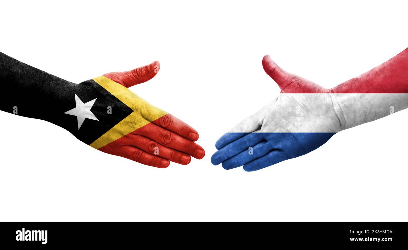 Handshake between Netherlands and Timor Leste flags painted on hands ...